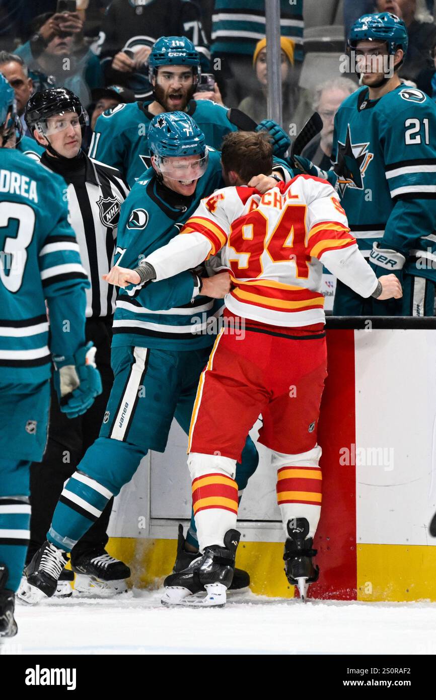 San Jose Sharks center Nico Sturm (7) and Calgary Flames defenseman ...