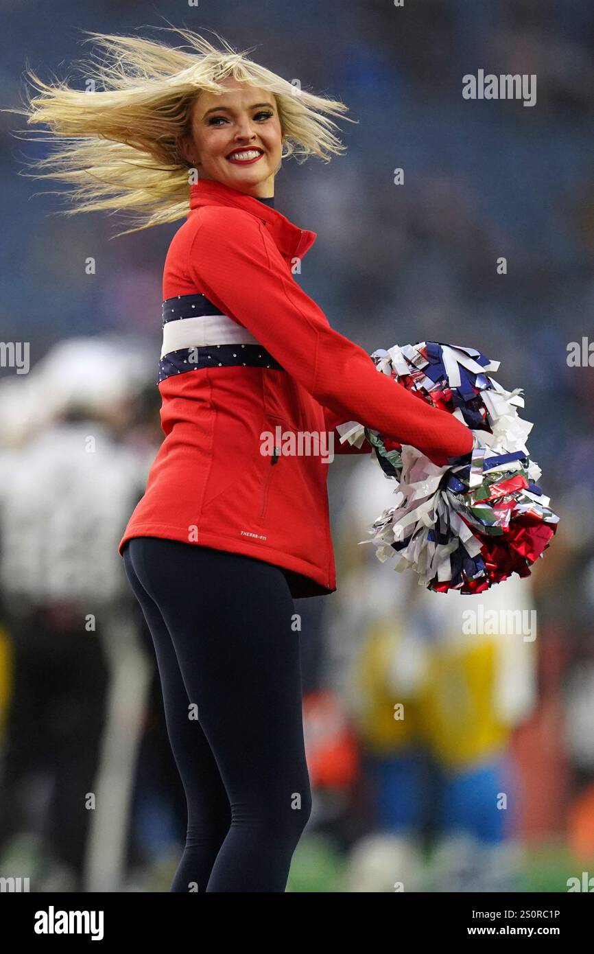 New England Patriots cheerleader performs during an NFL football game ...