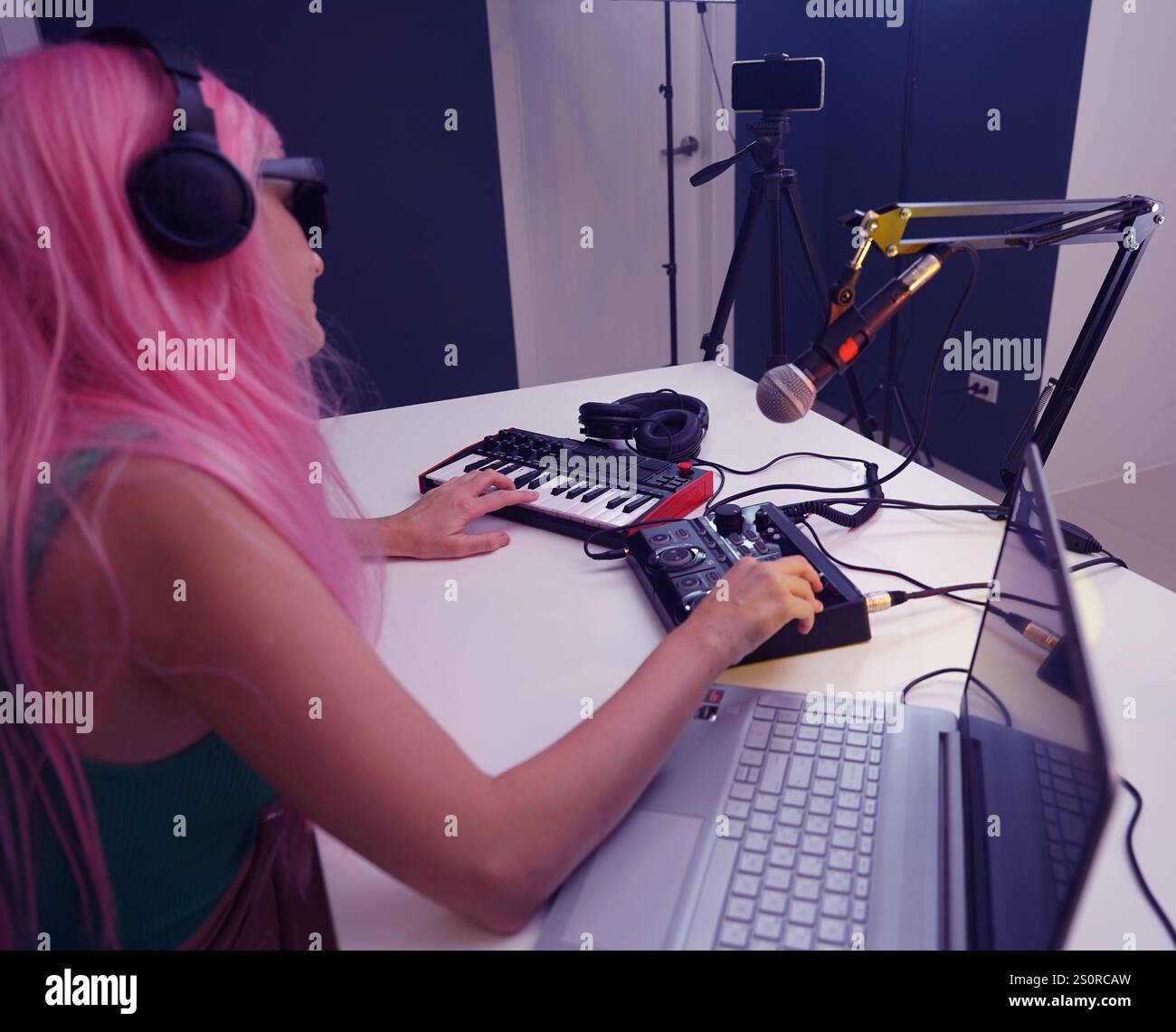 Beautiful young singer and musician broadcast from her home studio ...