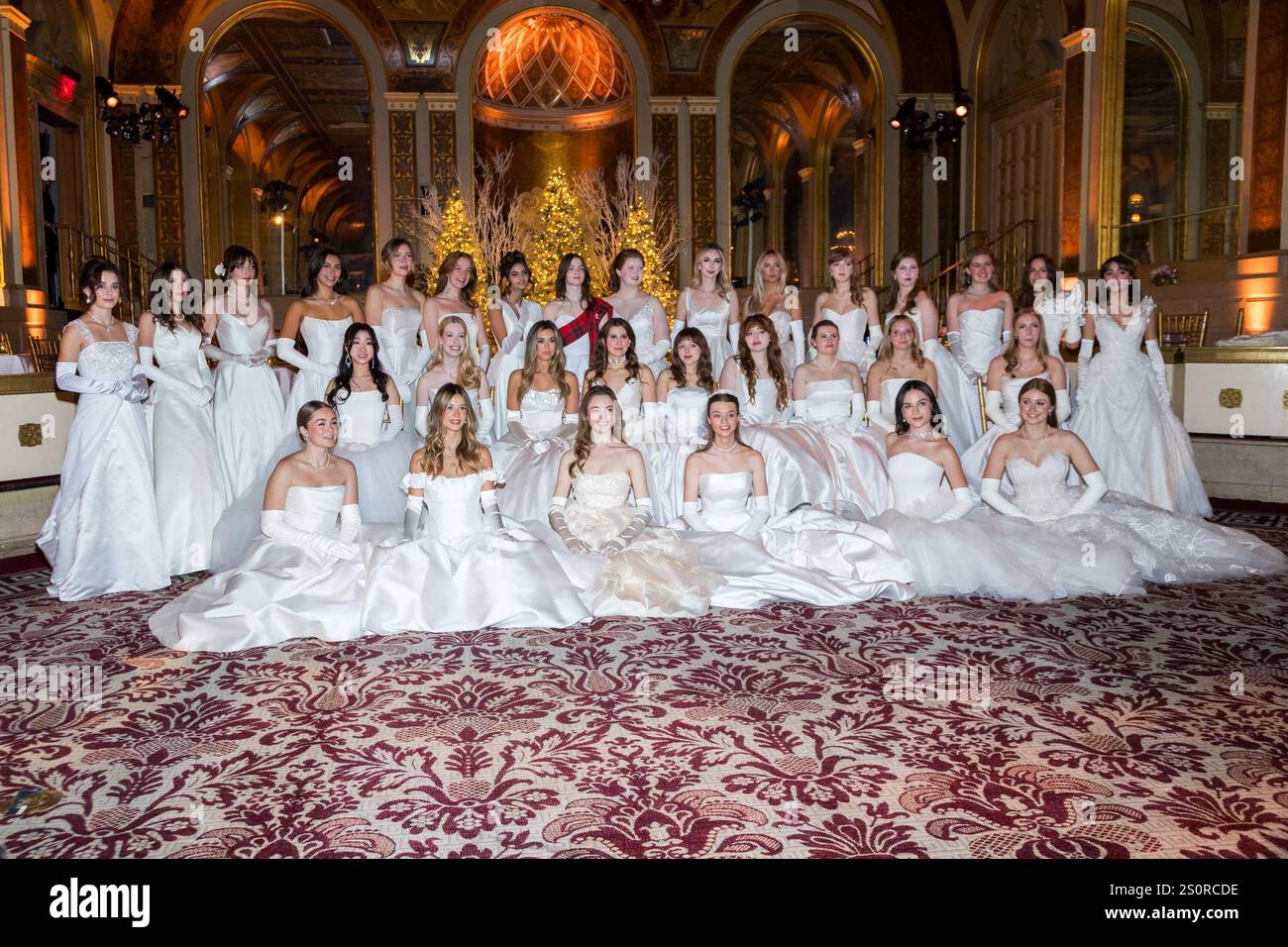 New York, NY, USA. 28th Dec, 2024. Debutantes pose for a group photo at ...