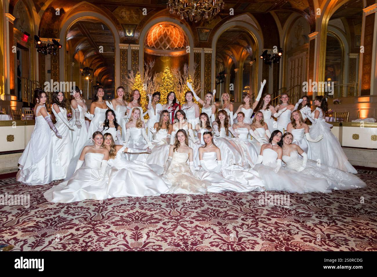 New York, NY, USA. 28th Dec, 2024. Debutantes pose for a group photo at ...