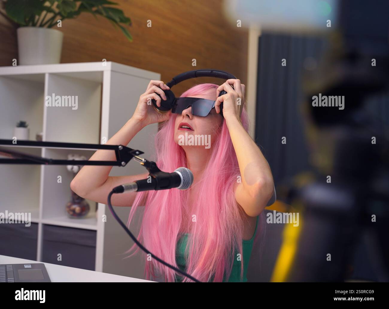 Beautiful young singer and musician broadcast from her home studio ...