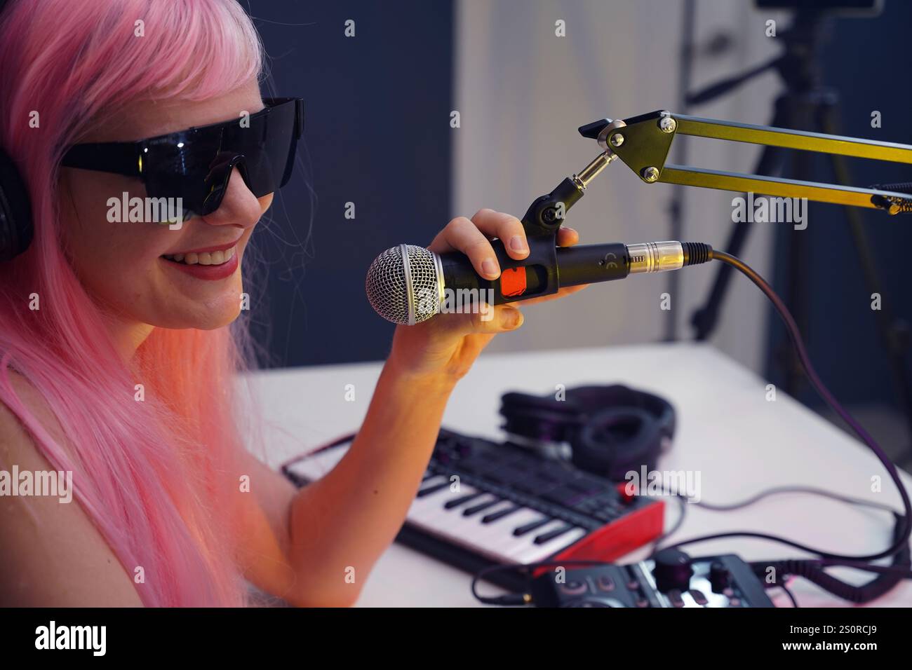 Beautiful young singer and musician broadcast from her home studio ...