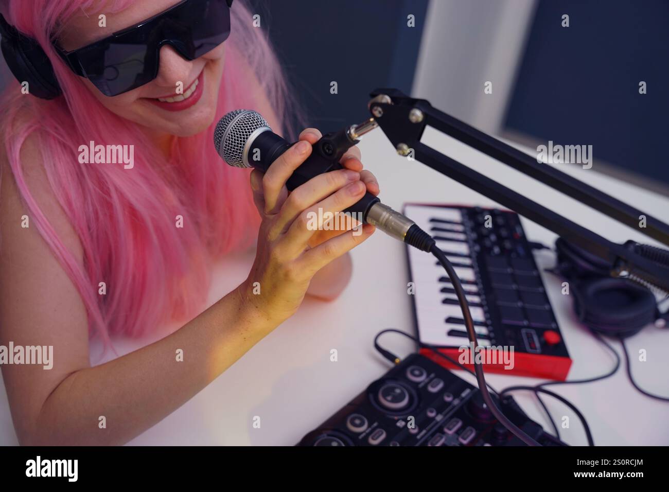 Beautiful young singer and musician broadcast from her home studio ...