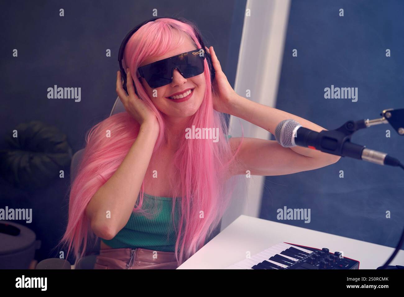 Beautiful young singer and musician broadcast from her home studio ...