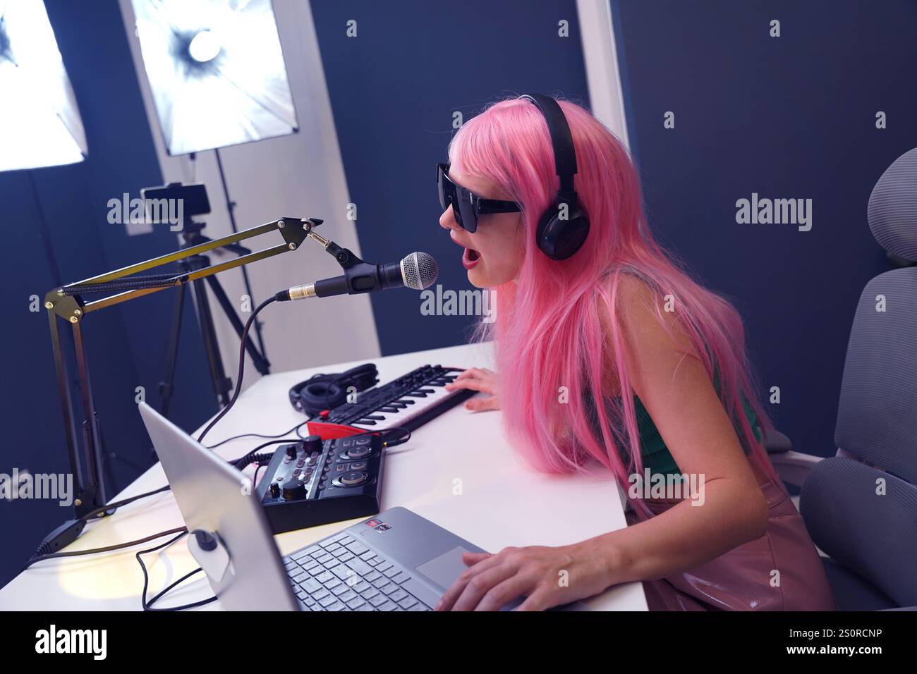 Beautiful young singer and musician broadcast from her home studio ...