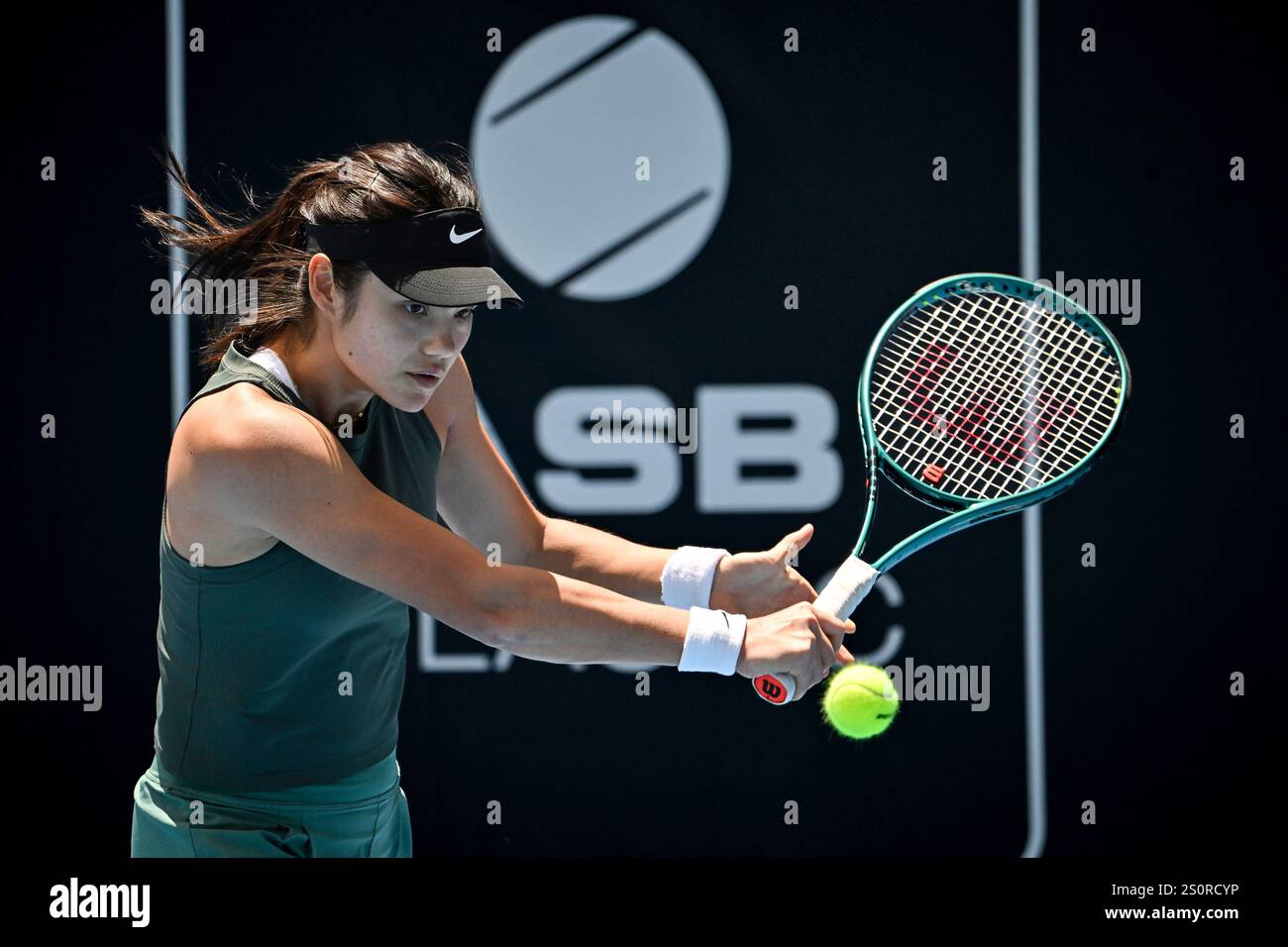 Emma Raducanu of Britain returns a shot during a practice session at ...
