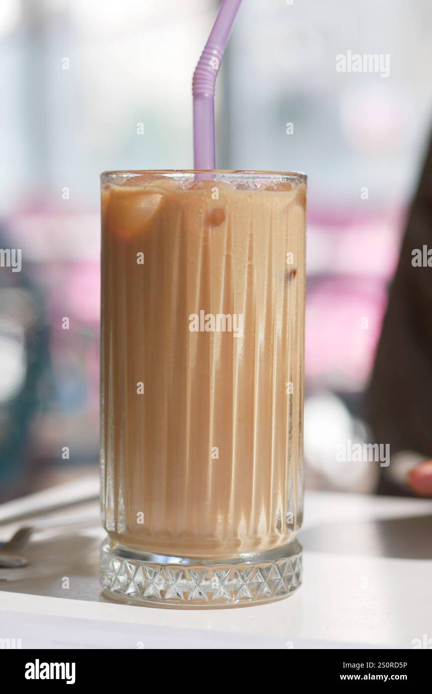 iced late in a transparent glass on cafe table Stock Photo - Alamy