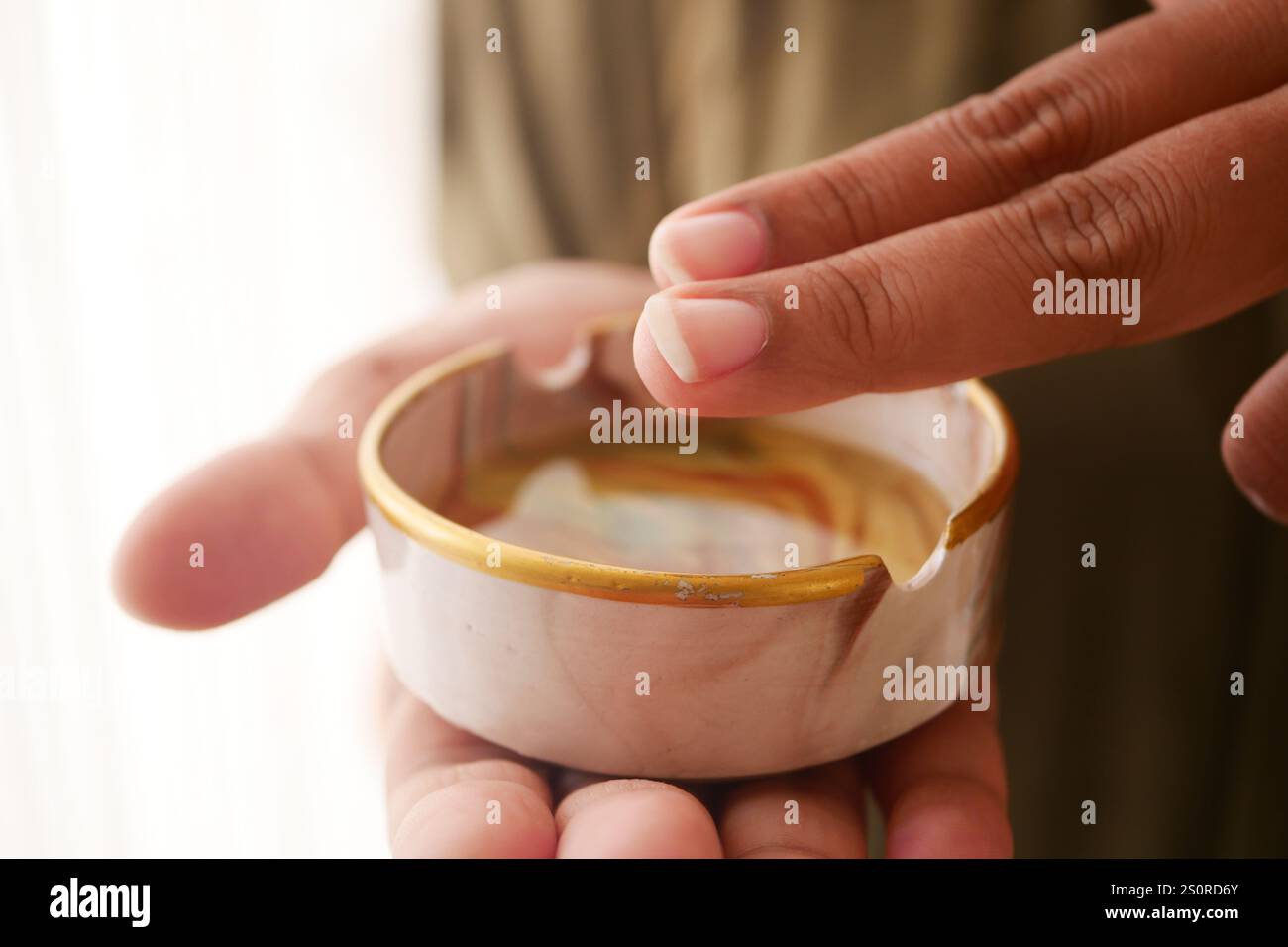 Closeup hand using olive oil hi-res stock photography and images - Alamy