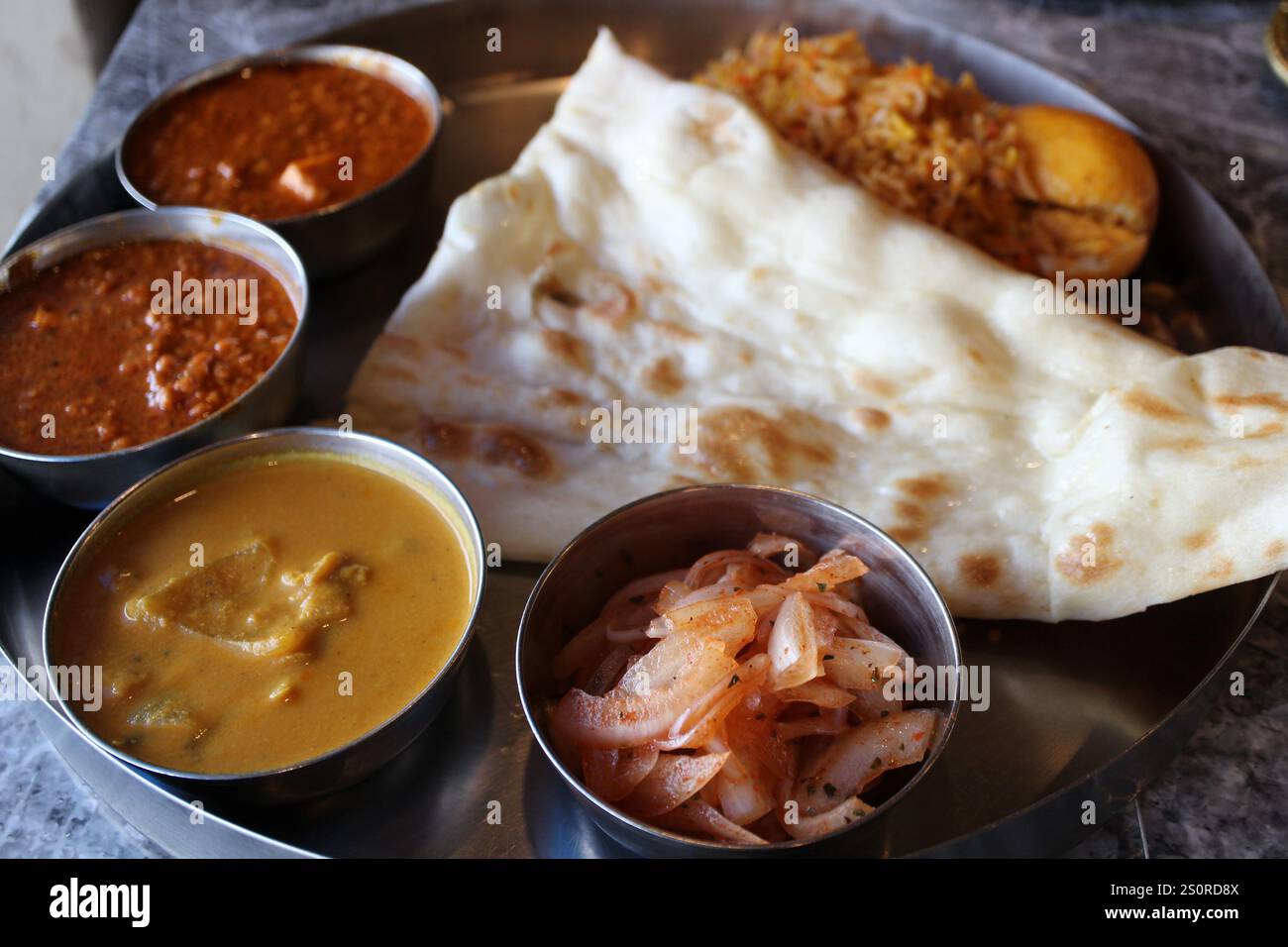 Indian cuisine: curry lunch plate (chicken keema curry, seafood curry ...