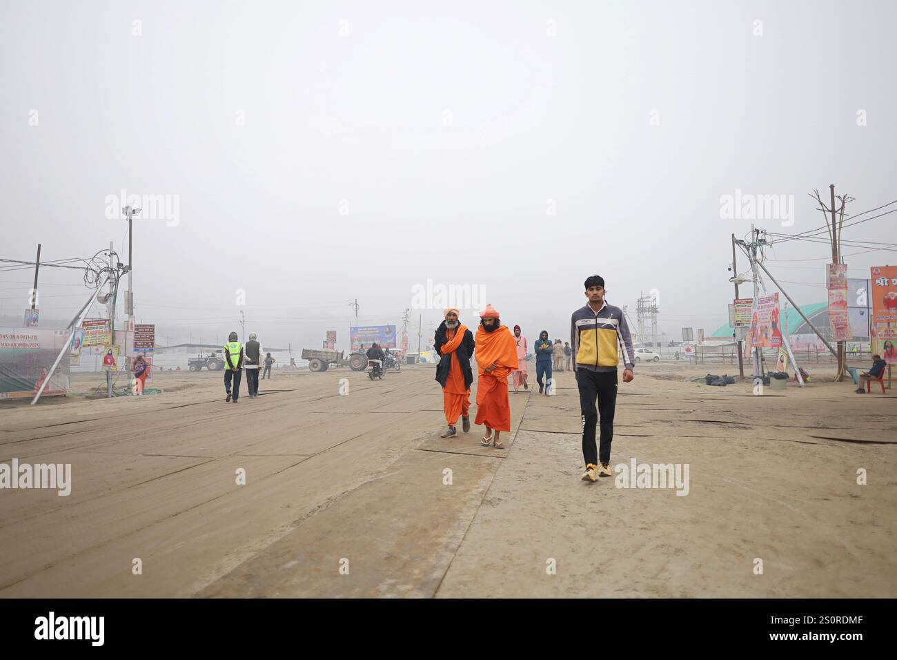 Holy men sage walk at the mela ground area at bank of Sangam confluence ...