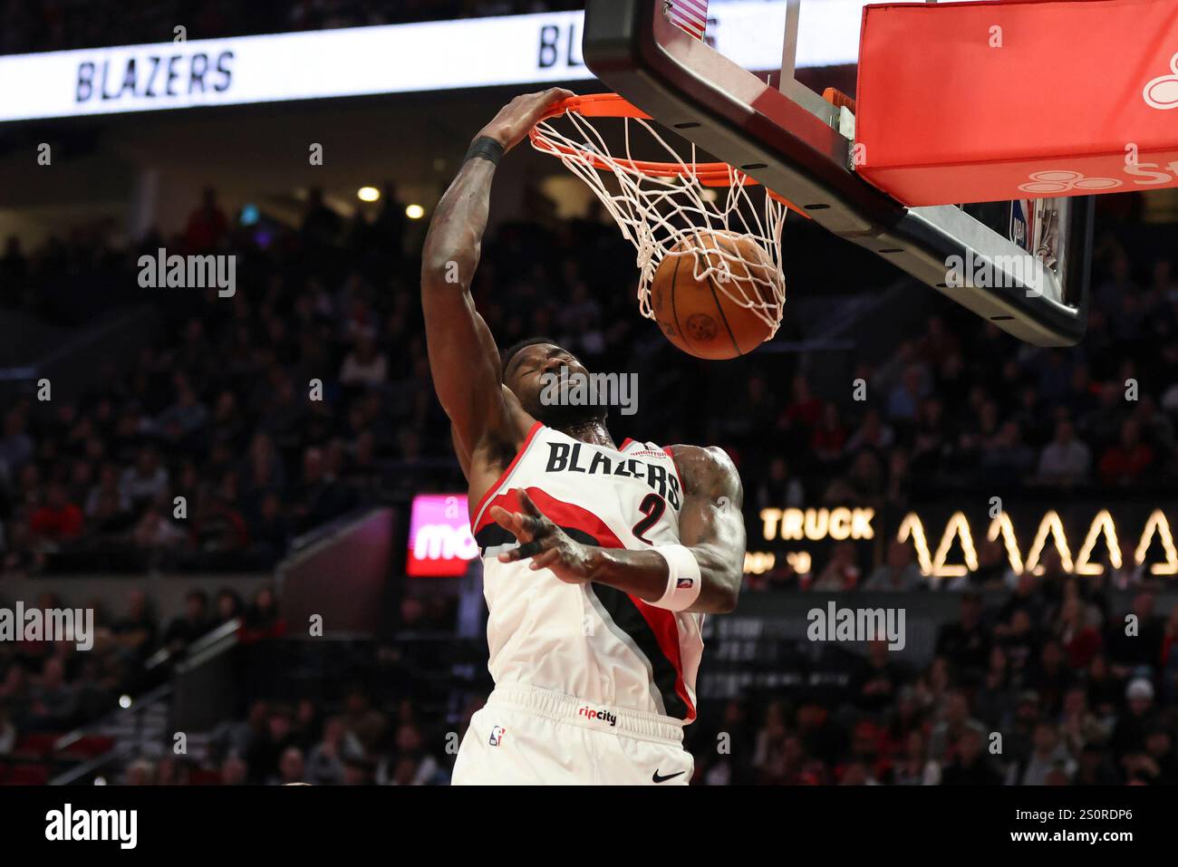 Portland Trail Blazers center Deandre Ayton (2) dunks against the ...