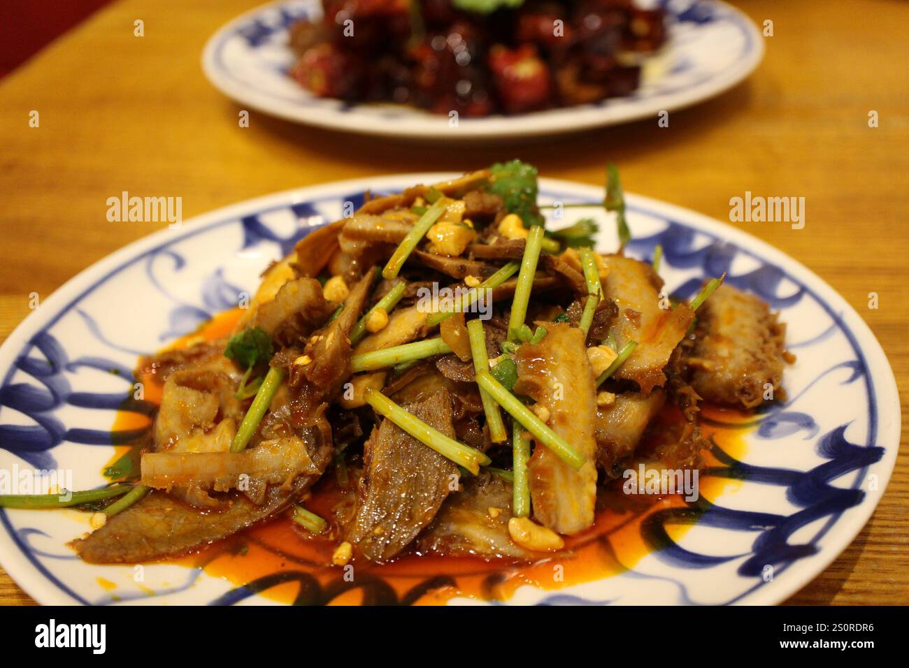 Sichuan cuisine (Chinese cuisine): beef shank and tripe tossed in chili ...