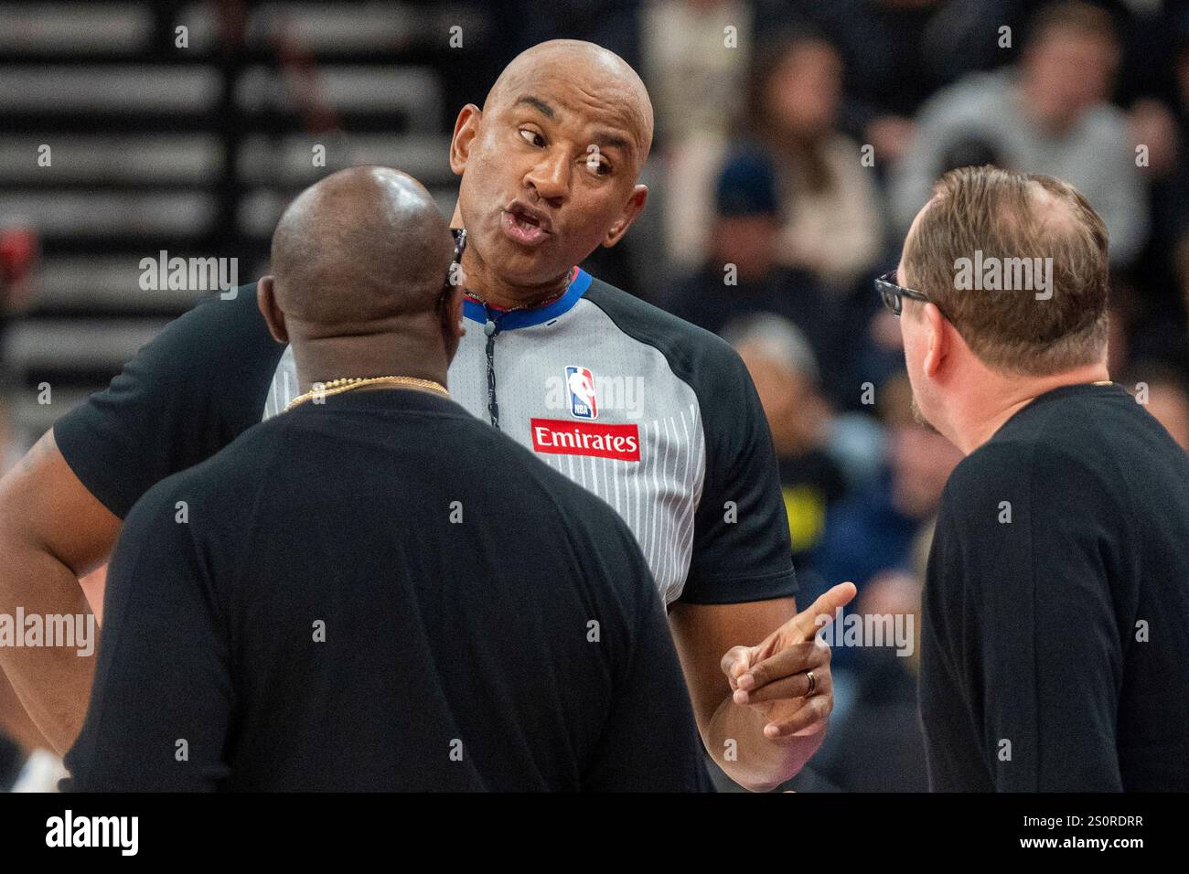 NBA official Kevin Cutler (34) has a chat with Philadelphia 76ers head ...