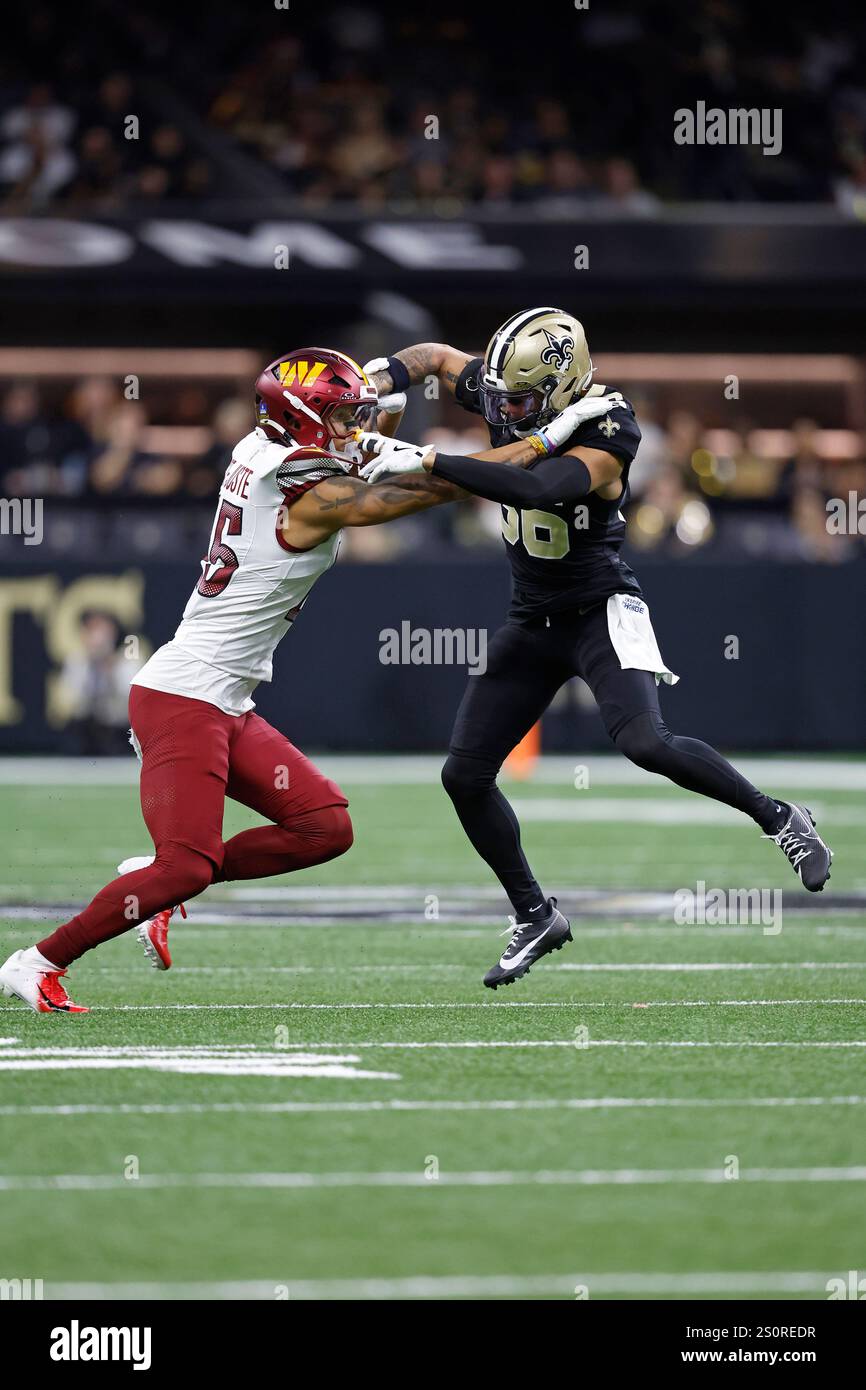 Washington Commanders cornerback Benjamin St-Juste (25) defends New Orleans Saints cornerback ...