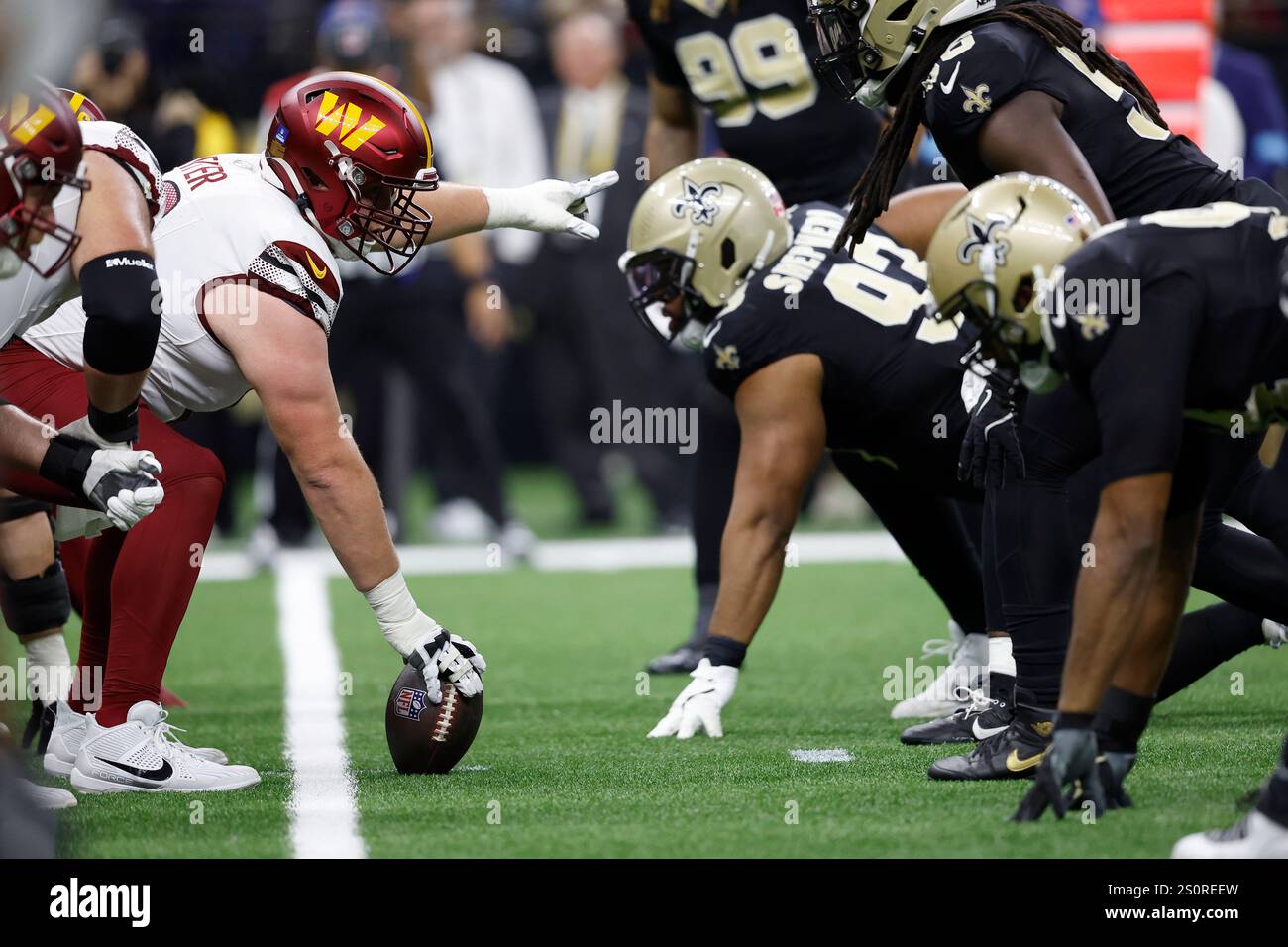 The Washington Commanders offenses lines up at the line of scrimmage ...