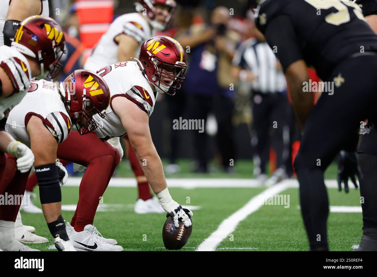 Washington Commanders guard Michael Deiter (60) lines up during an NFL ...