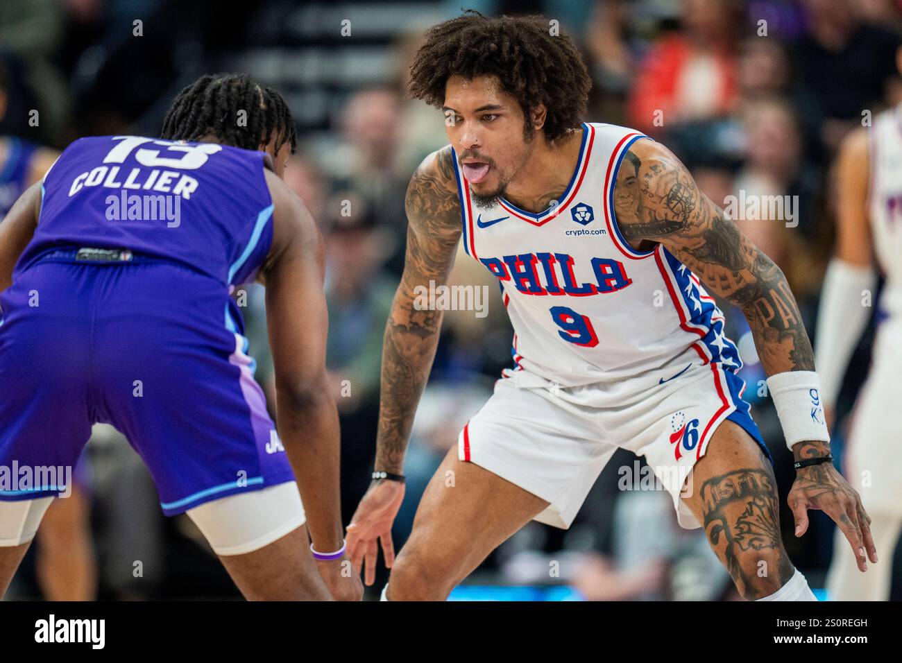 Philadelphia 76ers guard Kelly Oubre Jr. (9) guards Utah Jazz guard ...