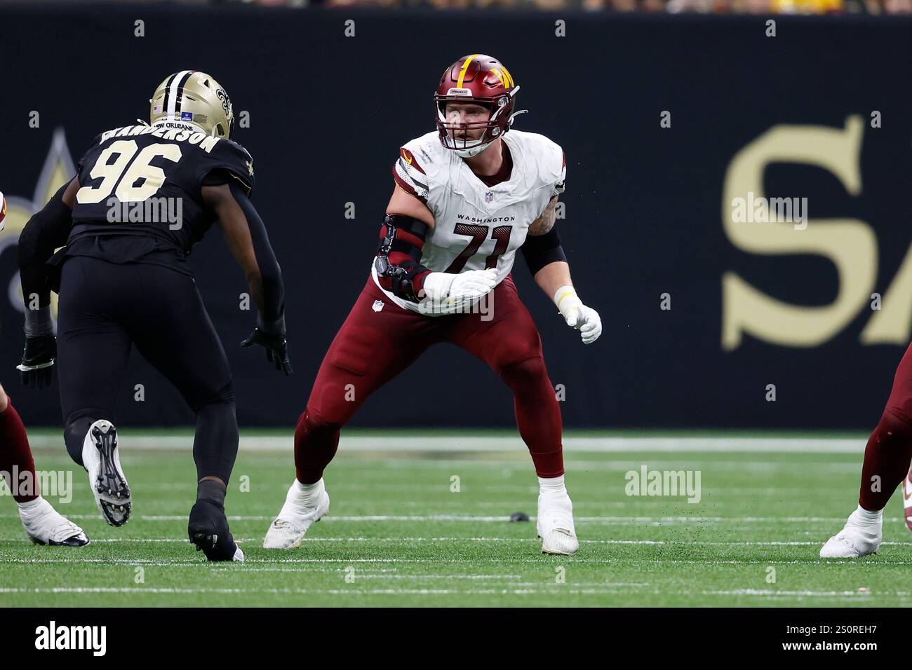 Washington Commanders guard Andrew Wylie (71) defends during an NFL ...
