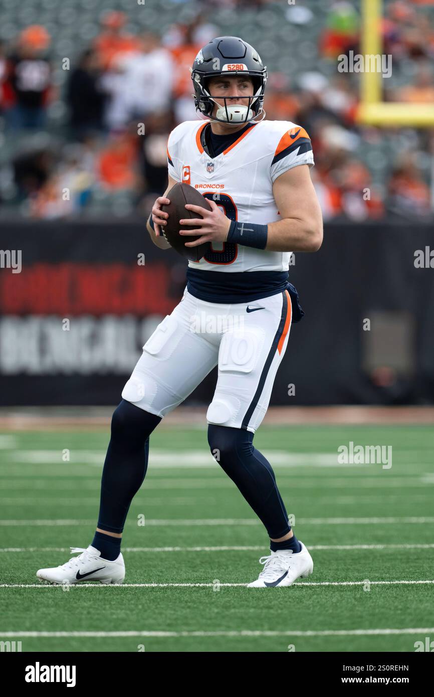 Denver Broncos quarterback Bo Nix warms up before an NFL football game ...