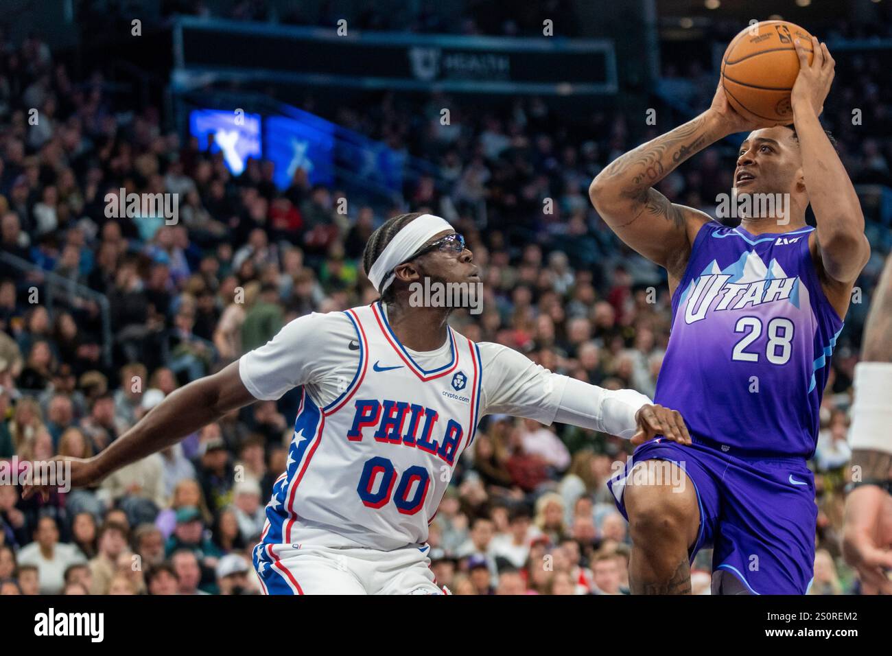 Utah Jazz forward Brice Sensabaugh (28) shoots as Philadelphia 76ers ...
