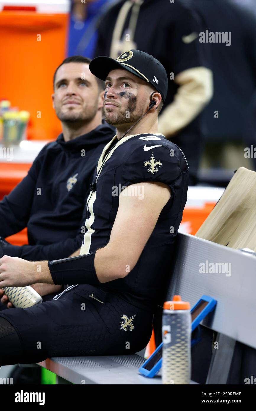 New Orleans Saints quarterback Jake Haener (3) watches from the bench ...