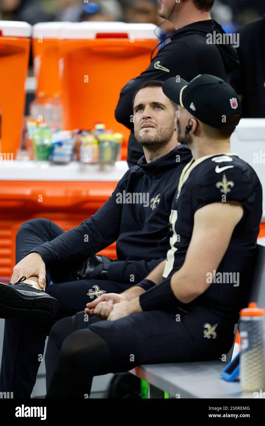 New Orleans Saints quarterback Derek Carr (4) watches from the bench ...