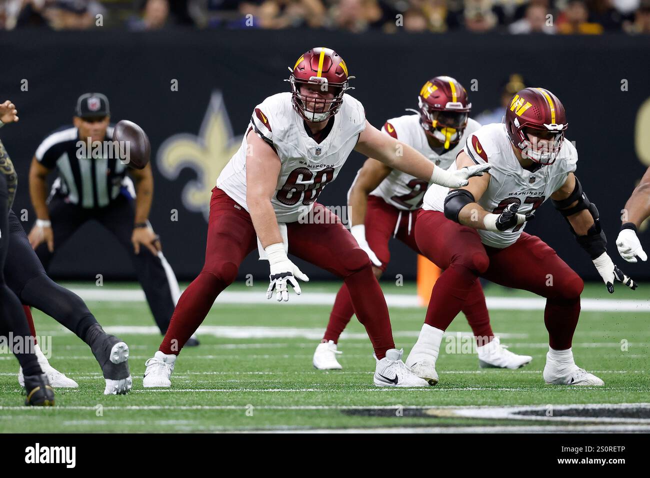 Washington Commanders guard Michael Deiter (60) defends during an NFL ...