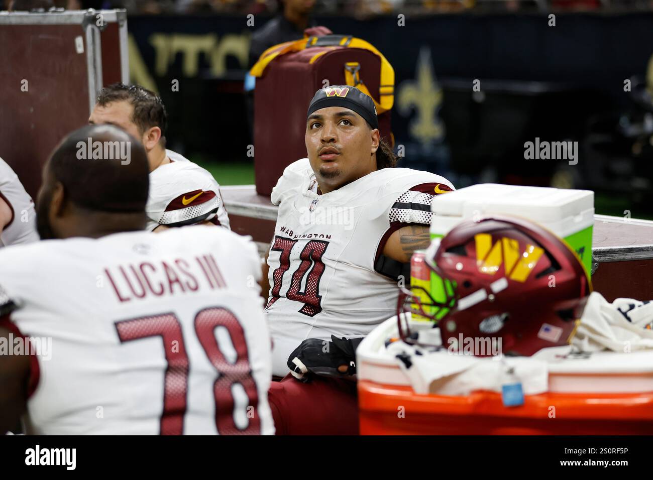 Washington Commanders offensive tackle Brandon Coleman (74) watches ...