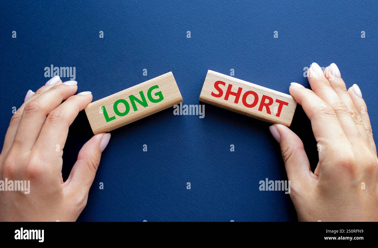 Short vs Long symbol. Concept word Short vs Long on wooden blocks ...