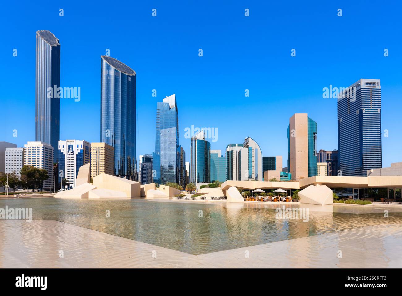 Al Musallah Mosque Prayer Hall and Abu Dhabi skyline. Abu Dhabi is the ...