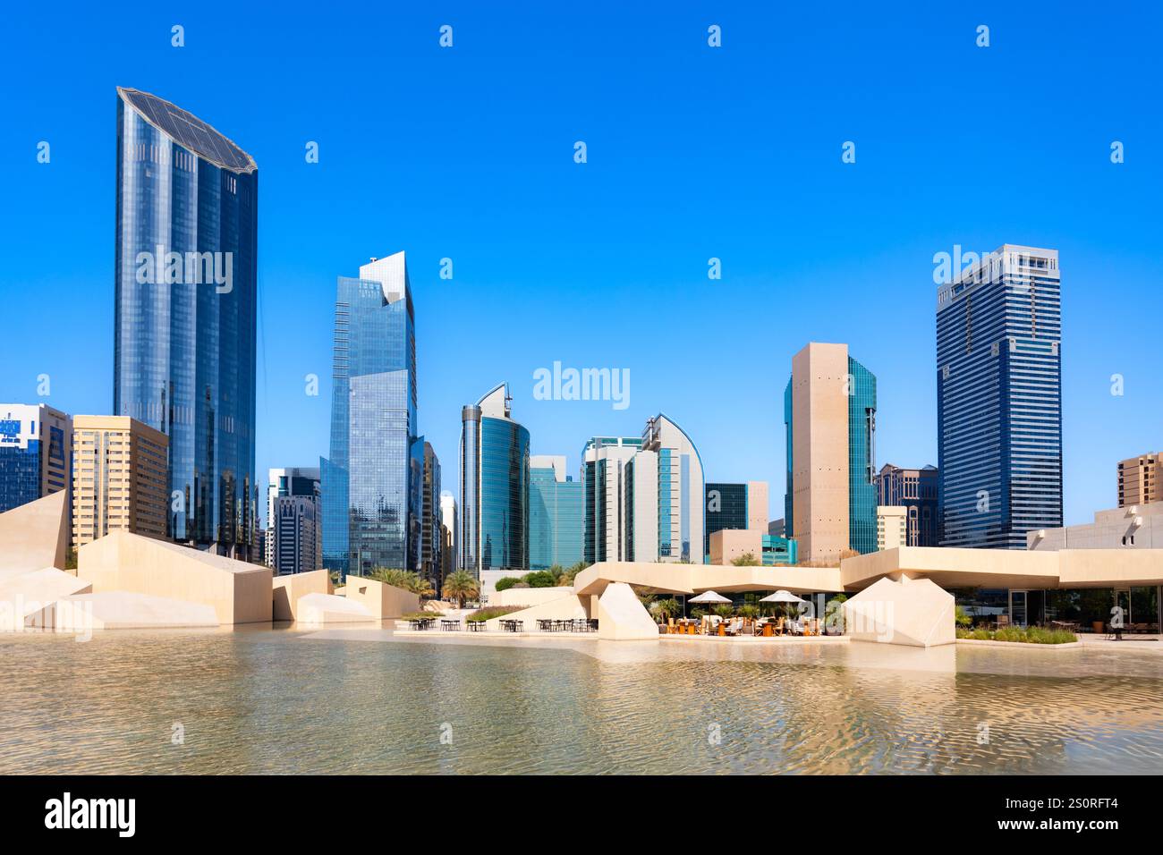 Al Musallah Mosque Prayer Hall and Abu Dhabi skyline. Abu Dhabi is the ...