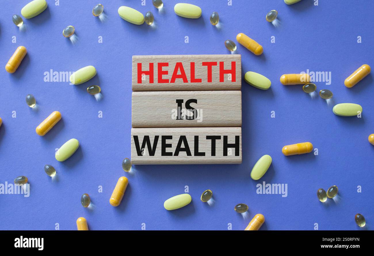 Health is Wealth symbol. Concept word Health is Wealth on wooden blocks ...