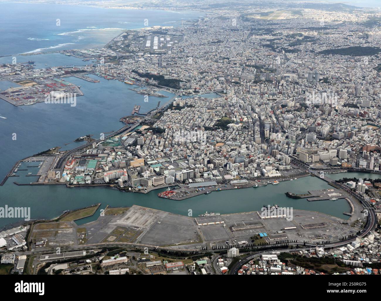 An aerial photo shows the United States Forces Japan's Naha Port (front ...