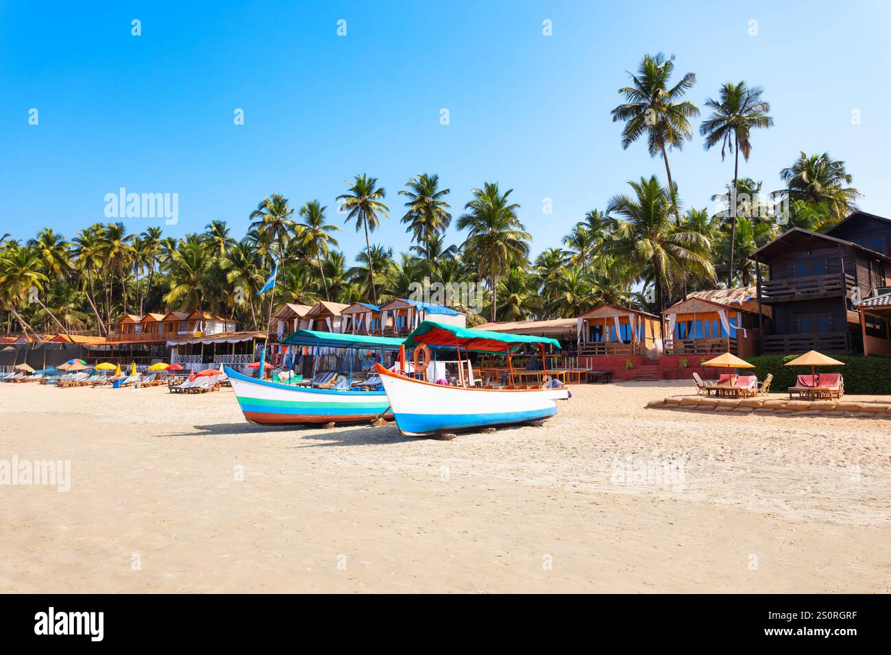 Boats at the Palolem Beach. Palolem Beach is situated in Canacona in ...
