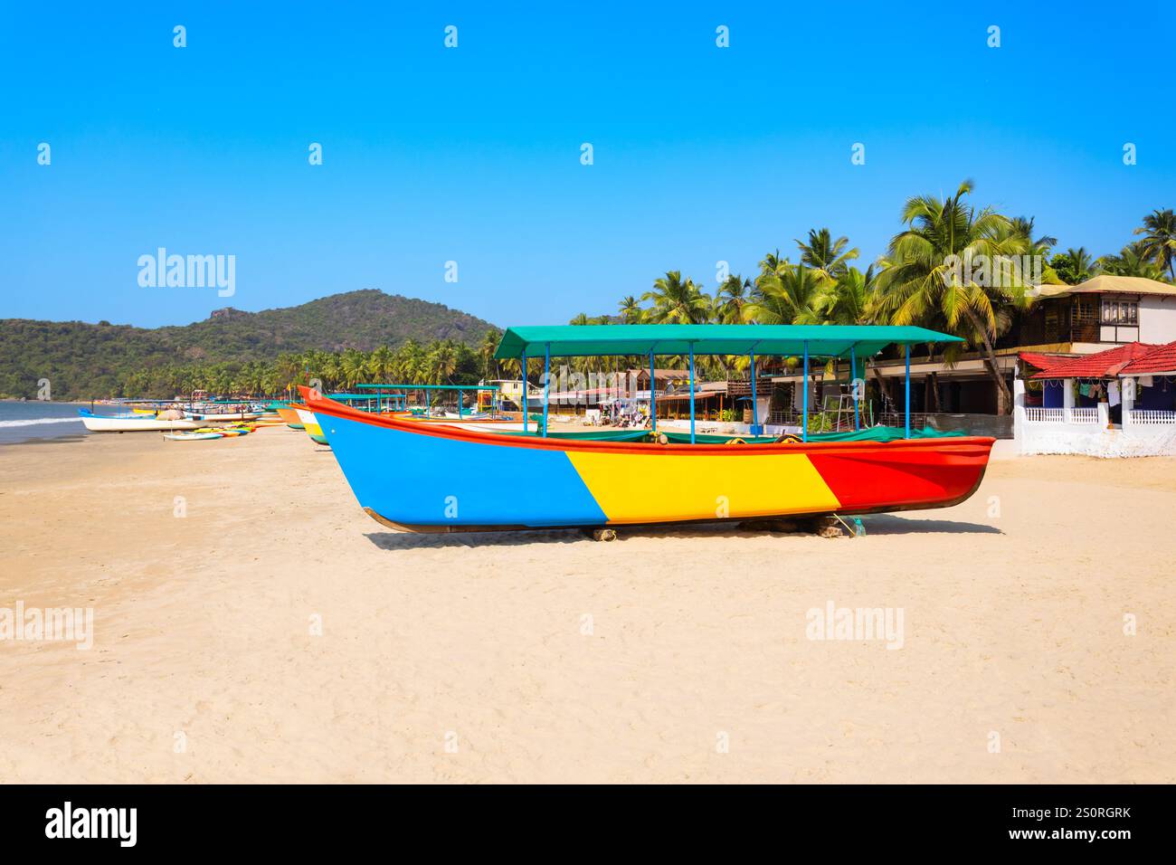 Boats at the Palolem Beach. Palolem Beach is situated in Canacona in ...