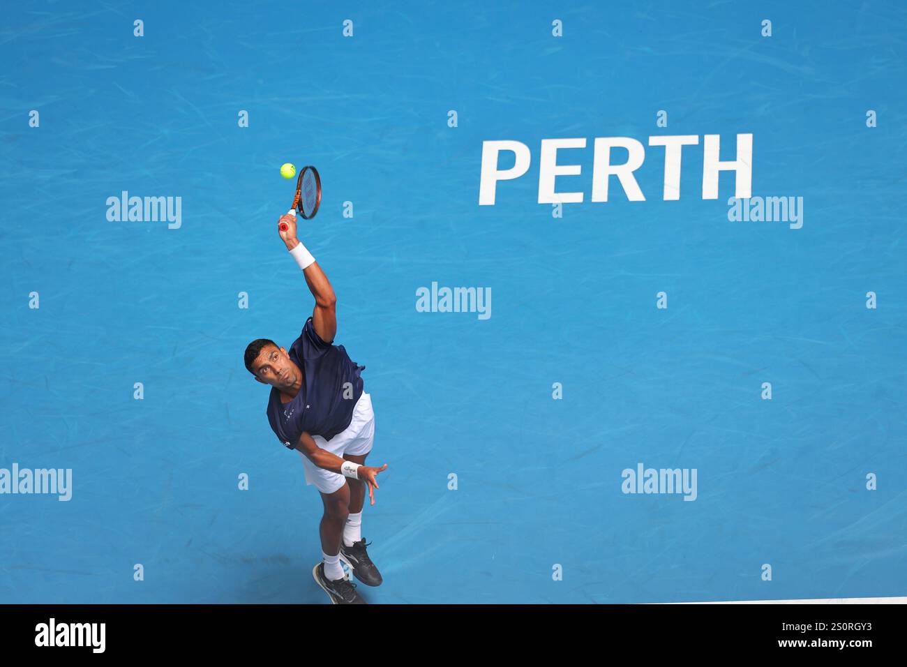 Thiago Monteiro of Brazil serves to opponent Alexander Zverev of ...