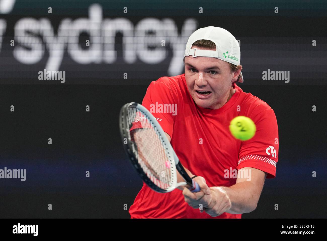 Switzerland's Dominic Stricker plays a backhand return to Italy's ...