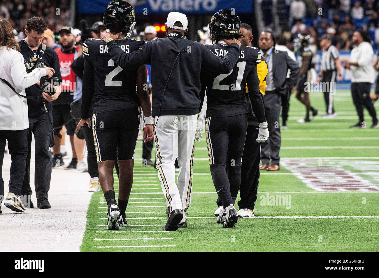 December 28, 2024: University of Colorado head coach Deion Sanders hugs ...