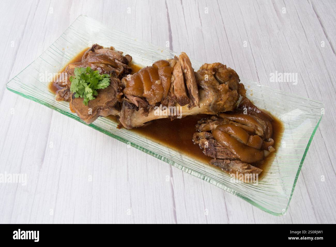 a dish of braised pig pork lean meat chopped and served up Stock Photo ...