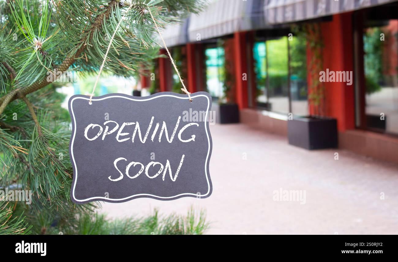 Opening soon symbol. Concept word Opening soon on black chalk ...