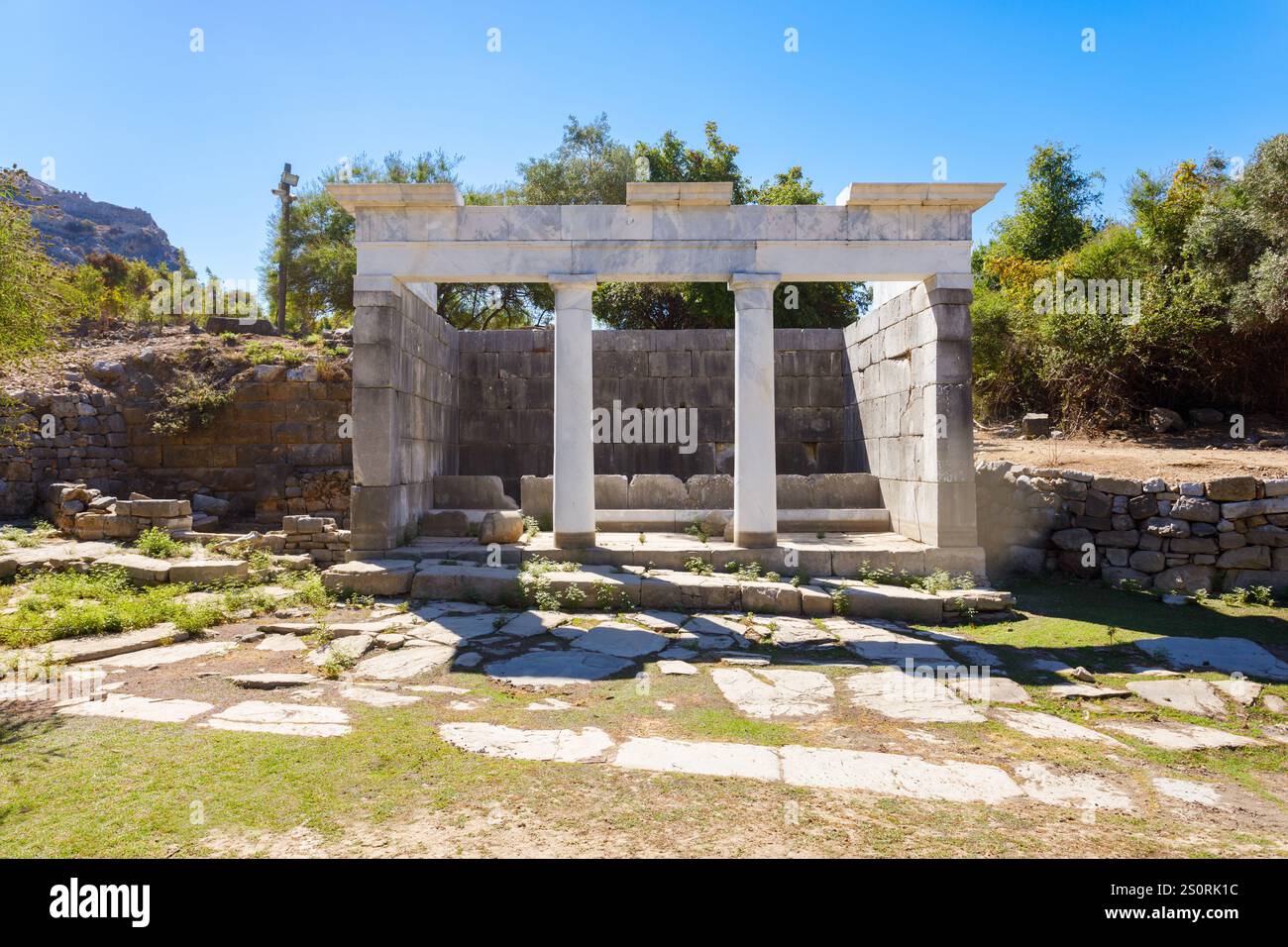 The fountain building ruins at the Kaunos ancient city. Kaunos is ...