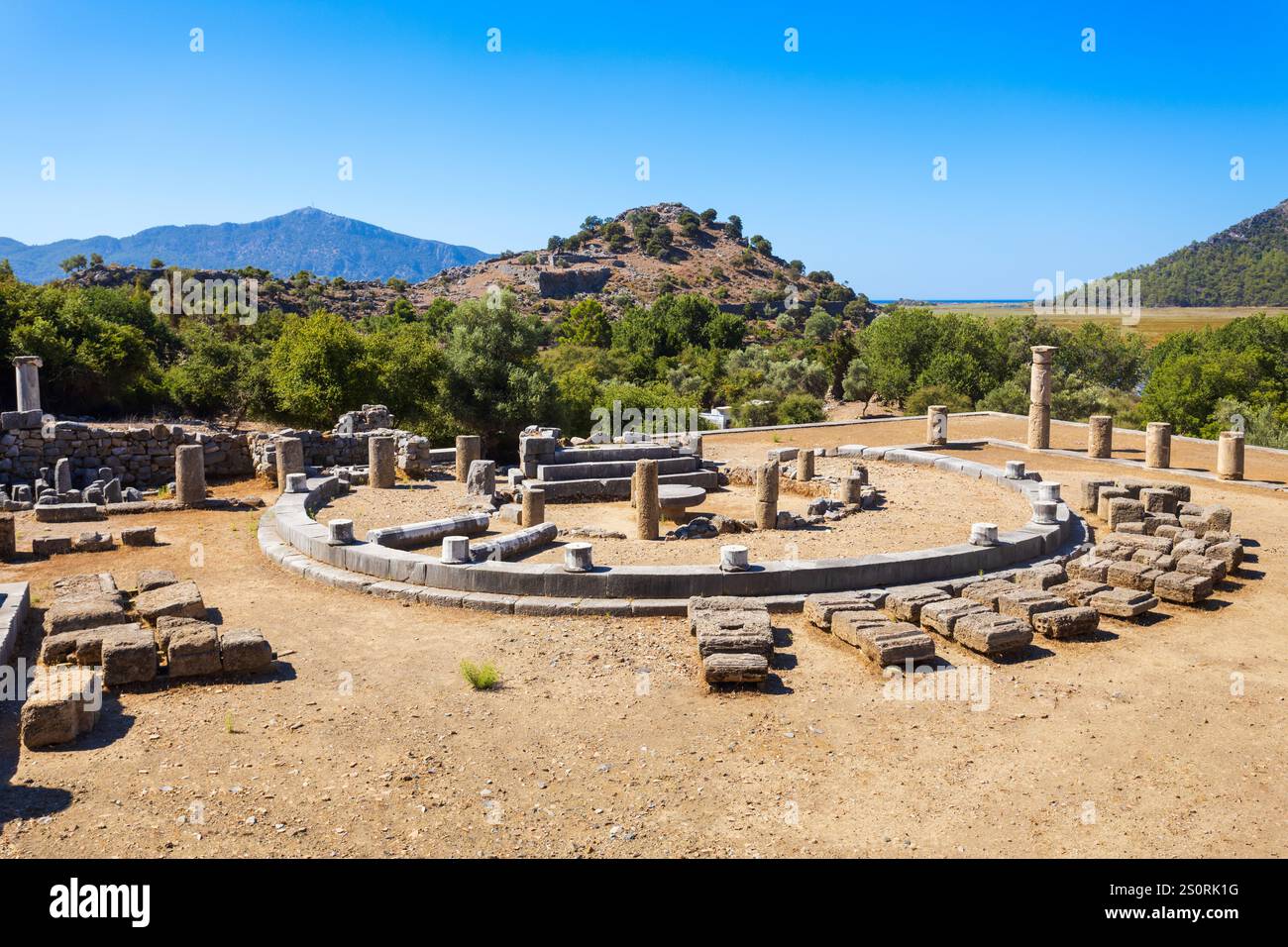 The temple terrace and the round structure ruins at the Kaunos ancient ...