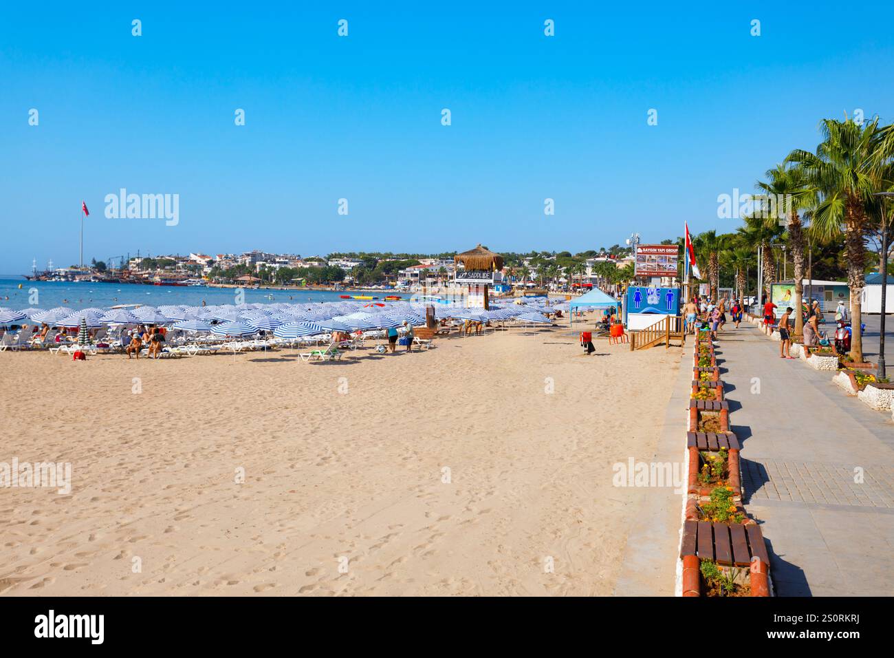 Didim, Turkey - July 30, 2022: People relaxing at the Didim city beach ...