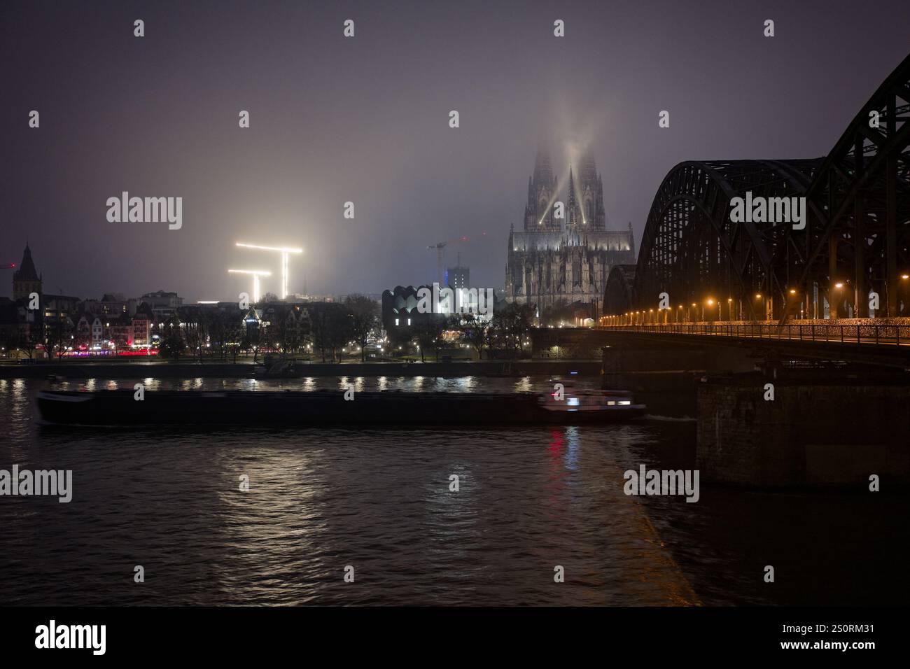 Cologne, Germany. 29th Dec, 2024. Cloudy weather makes the cones of ...
