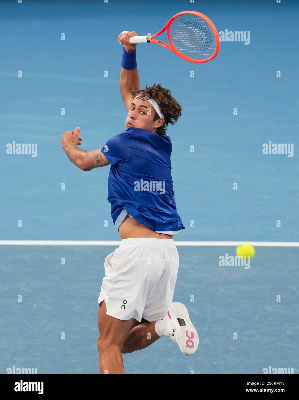 Italy's Flavio Cobolli plays a forehand return to Switzerland's Dominic ...