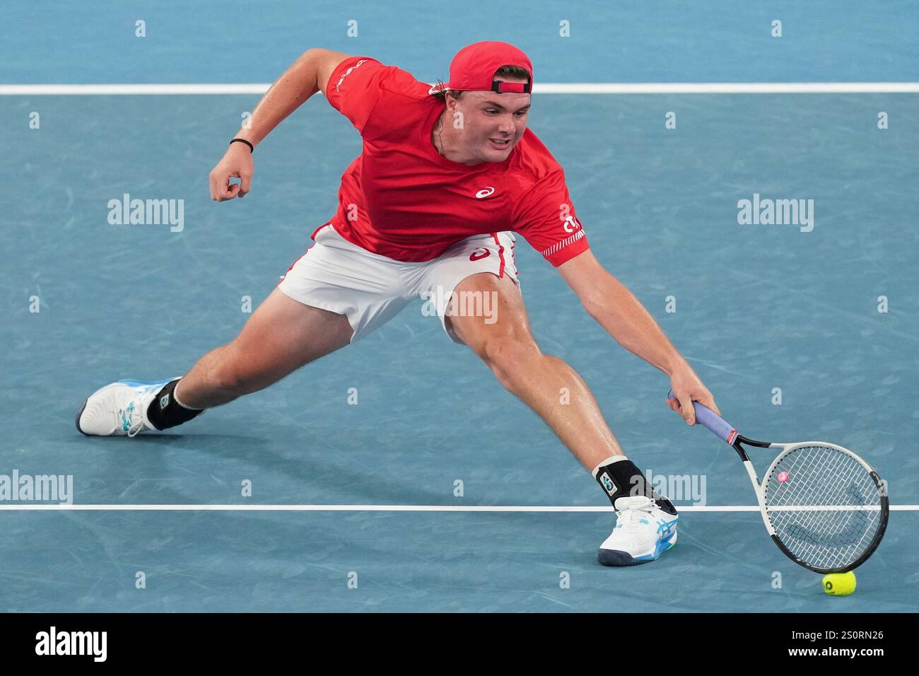Switzerland's Dominic Stricker plays a forehand return to Italy's ...