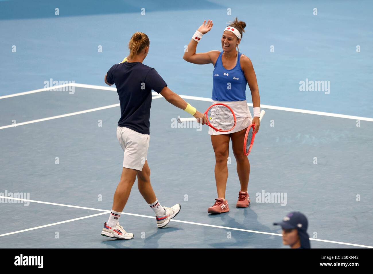 Rafeal Matos and Carolina Alves of Brazil celebrate winning a point ...