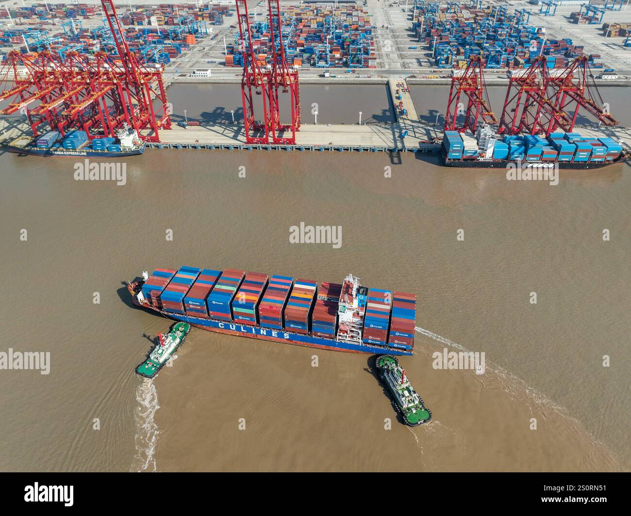 NINGBO, CHINA - DECEMBER 29, 2024 - Ships full of container cargo ...