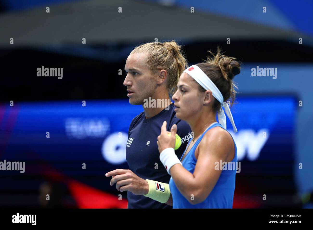 Rafeal Matos and Carolina Alves of Brazil talk between points against ...